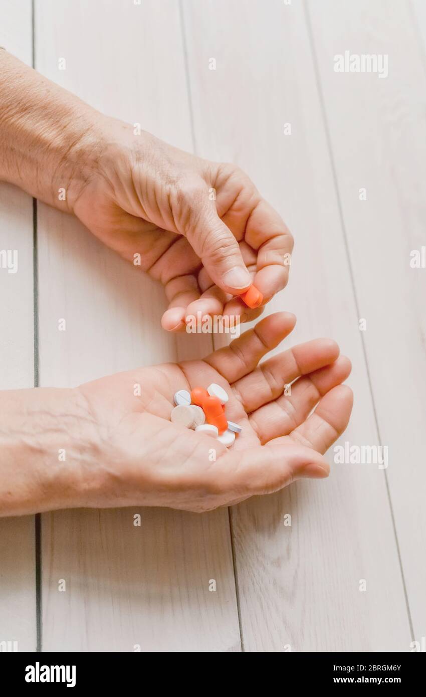 Old woman hand table hi-res stock photography and images - Alamy