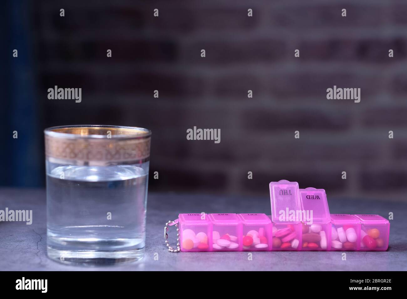 Pill box glass water hi-res stock photography and images - Alamy