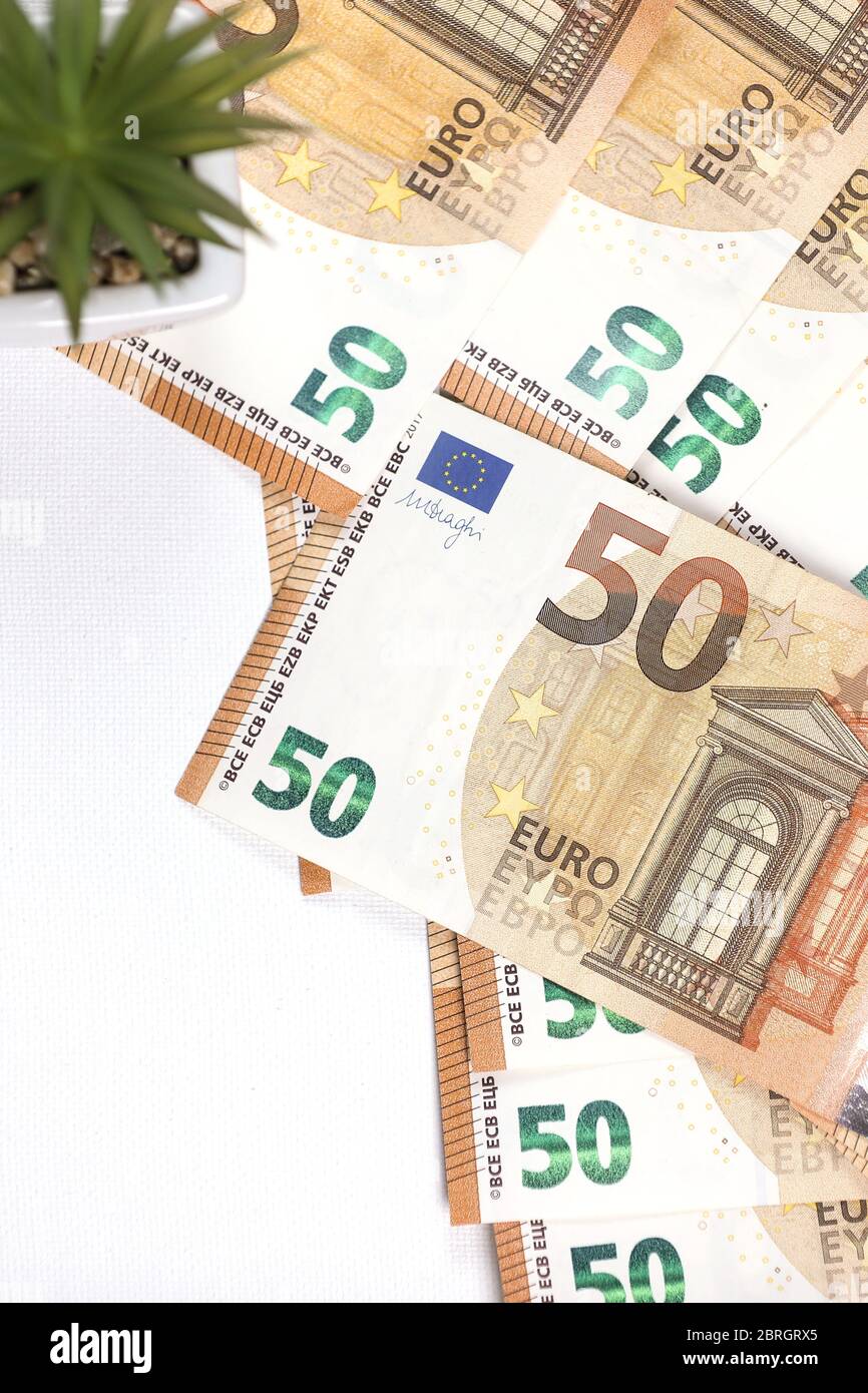 Stack of 50 euro banknotes isolated on a white background. Financial ...