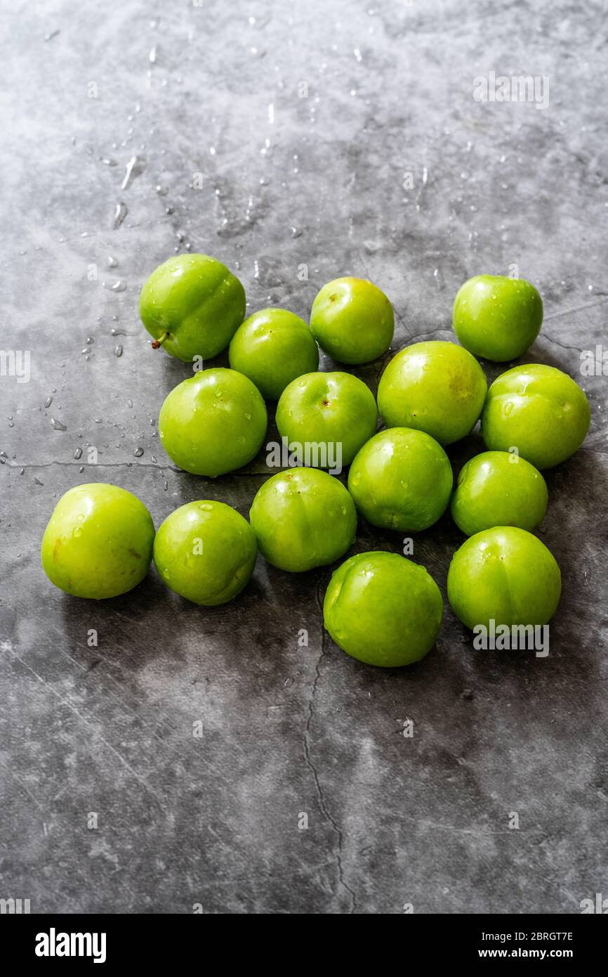 Raw Organic Sour Green Plums Ready to Eat. Healthy Food Stock Photo - Alamy