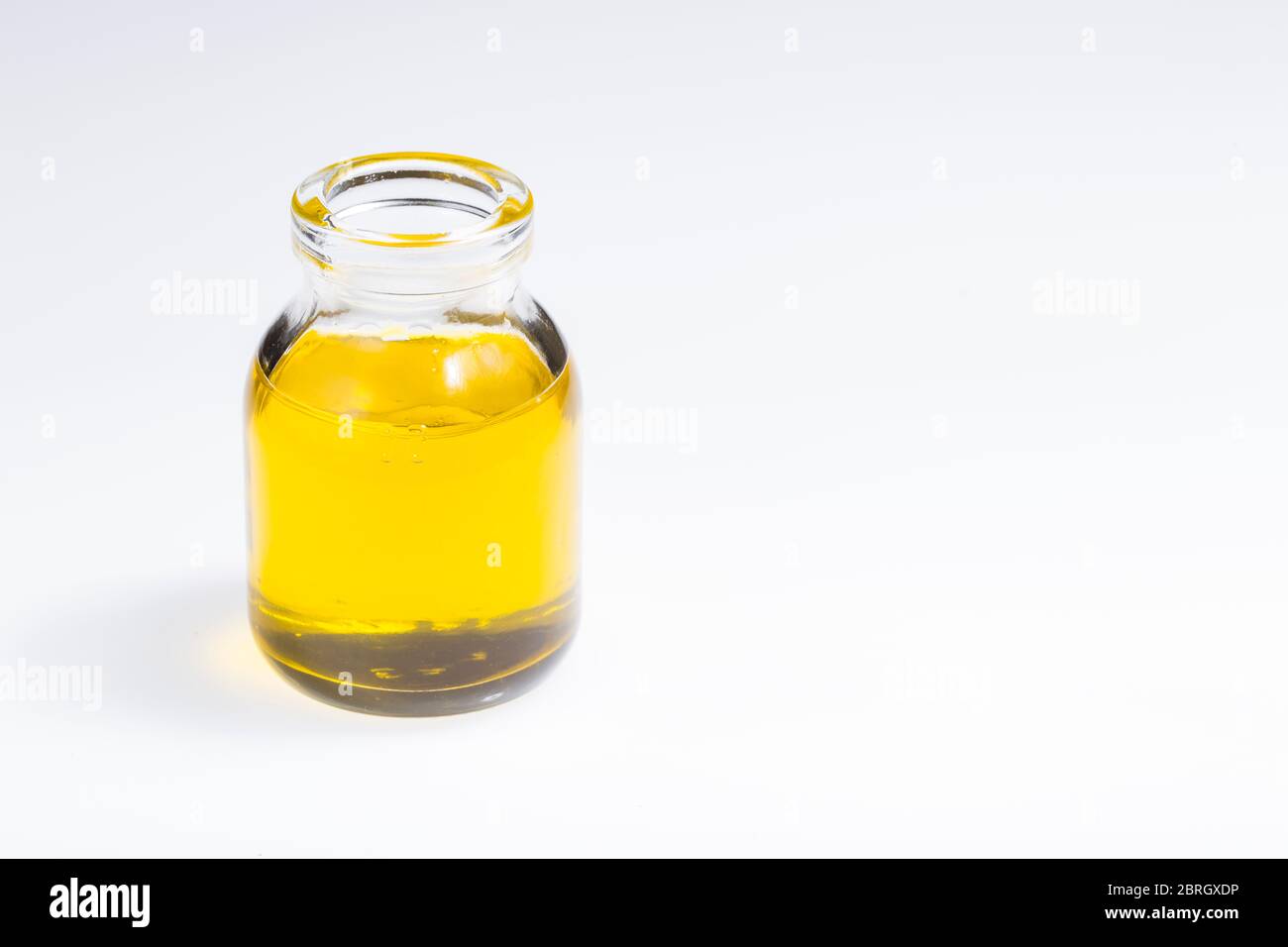 bottle with natural oil, isolated on white background, close-up Stock ...