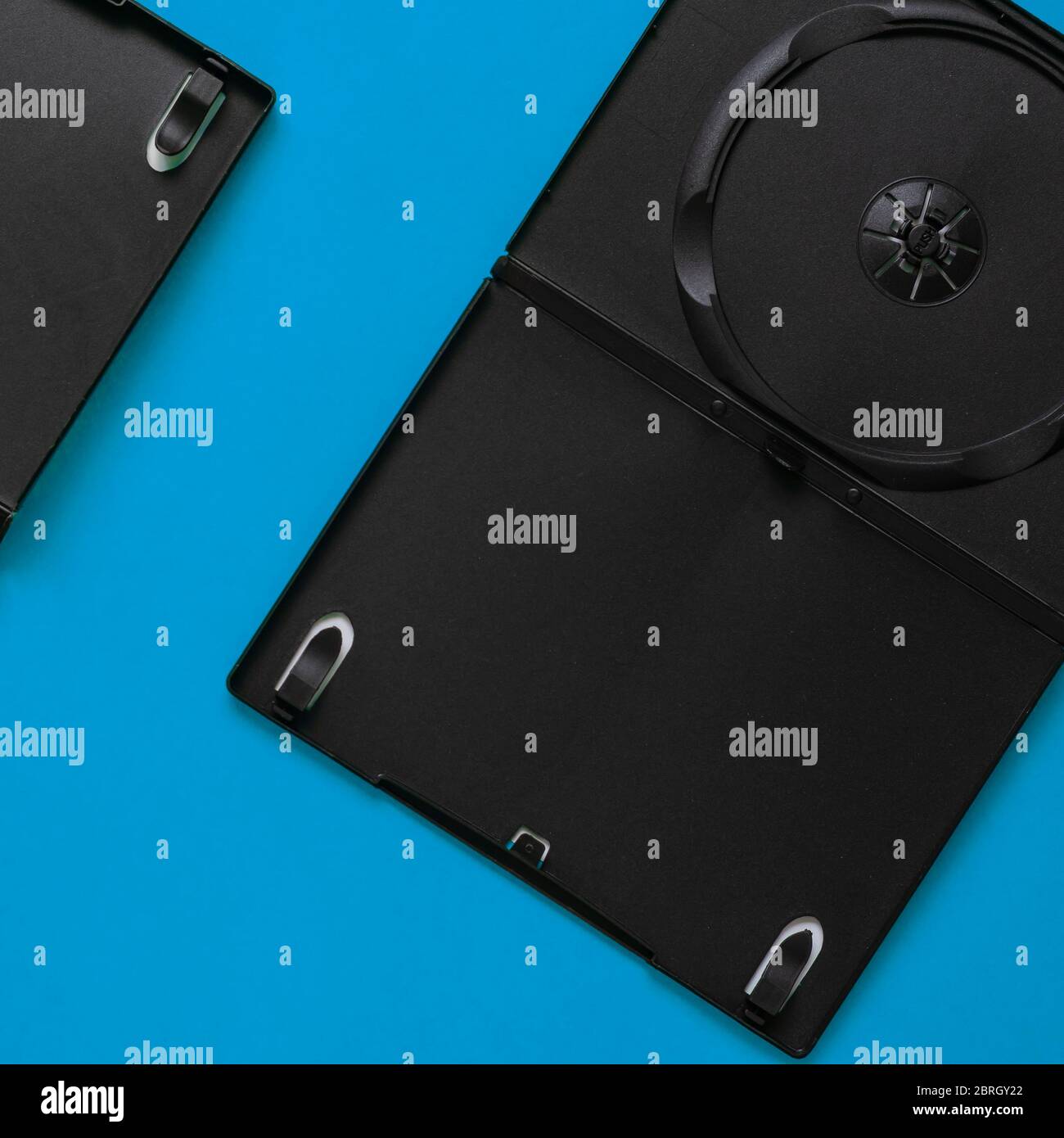 Open plastic box for DVD or blue ray discs. Black open boxes on a ...