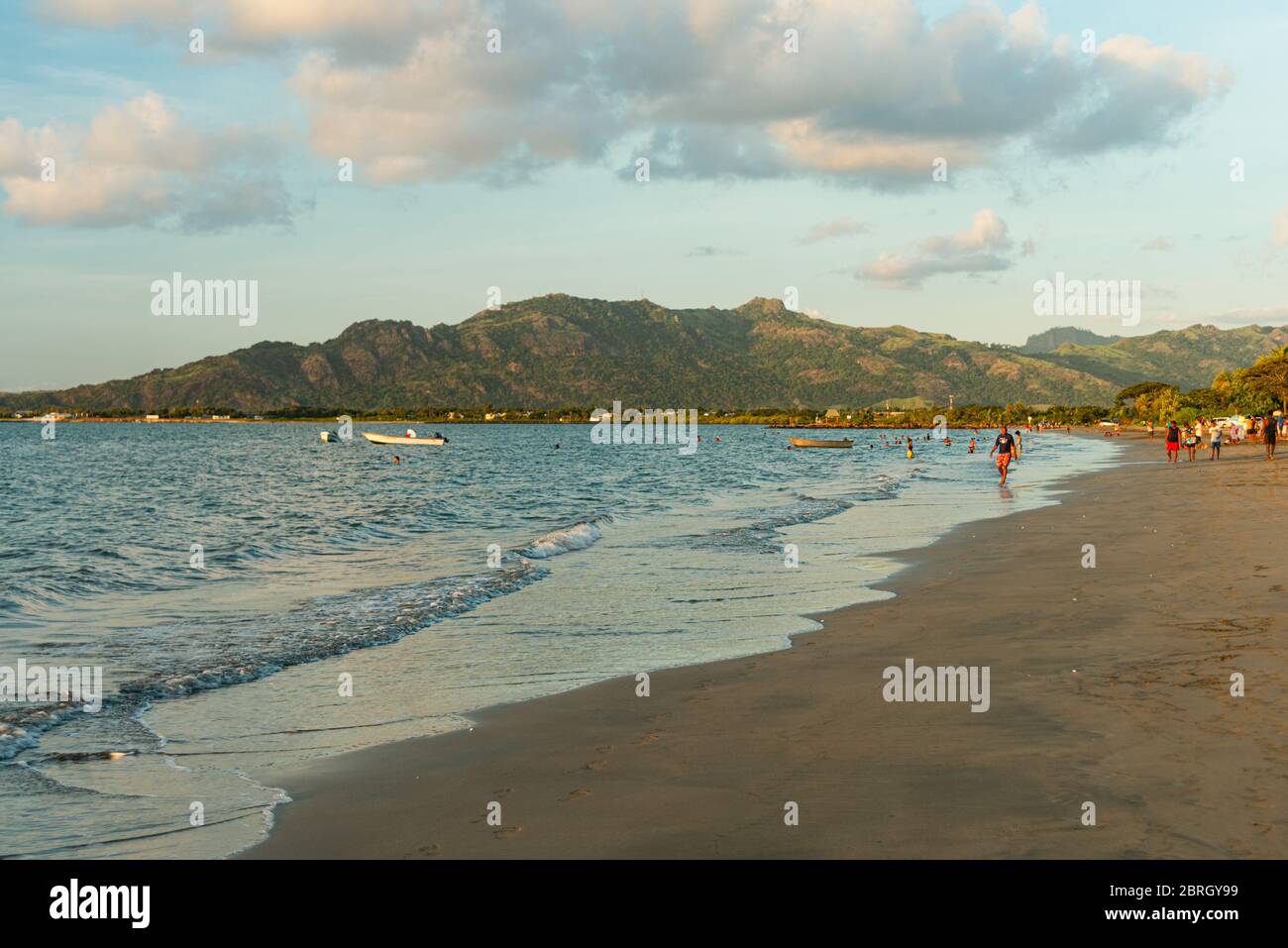 View along the beach of Nadi, Viti Levu, Fiji. Just before sunset ...