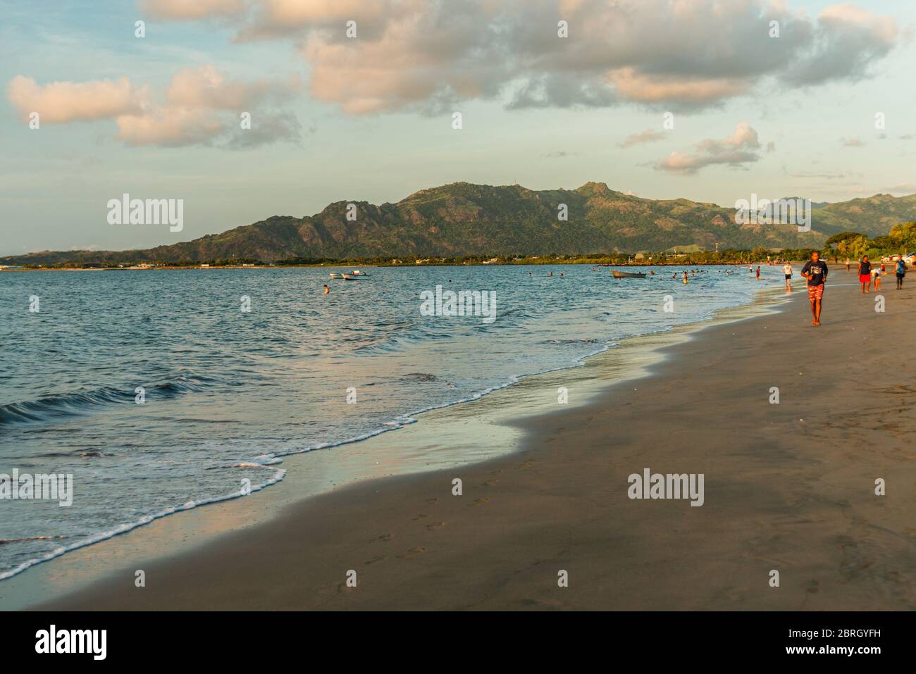 View along the beach of Nadi, Viti Levu, Fiji. Just before sunset ...