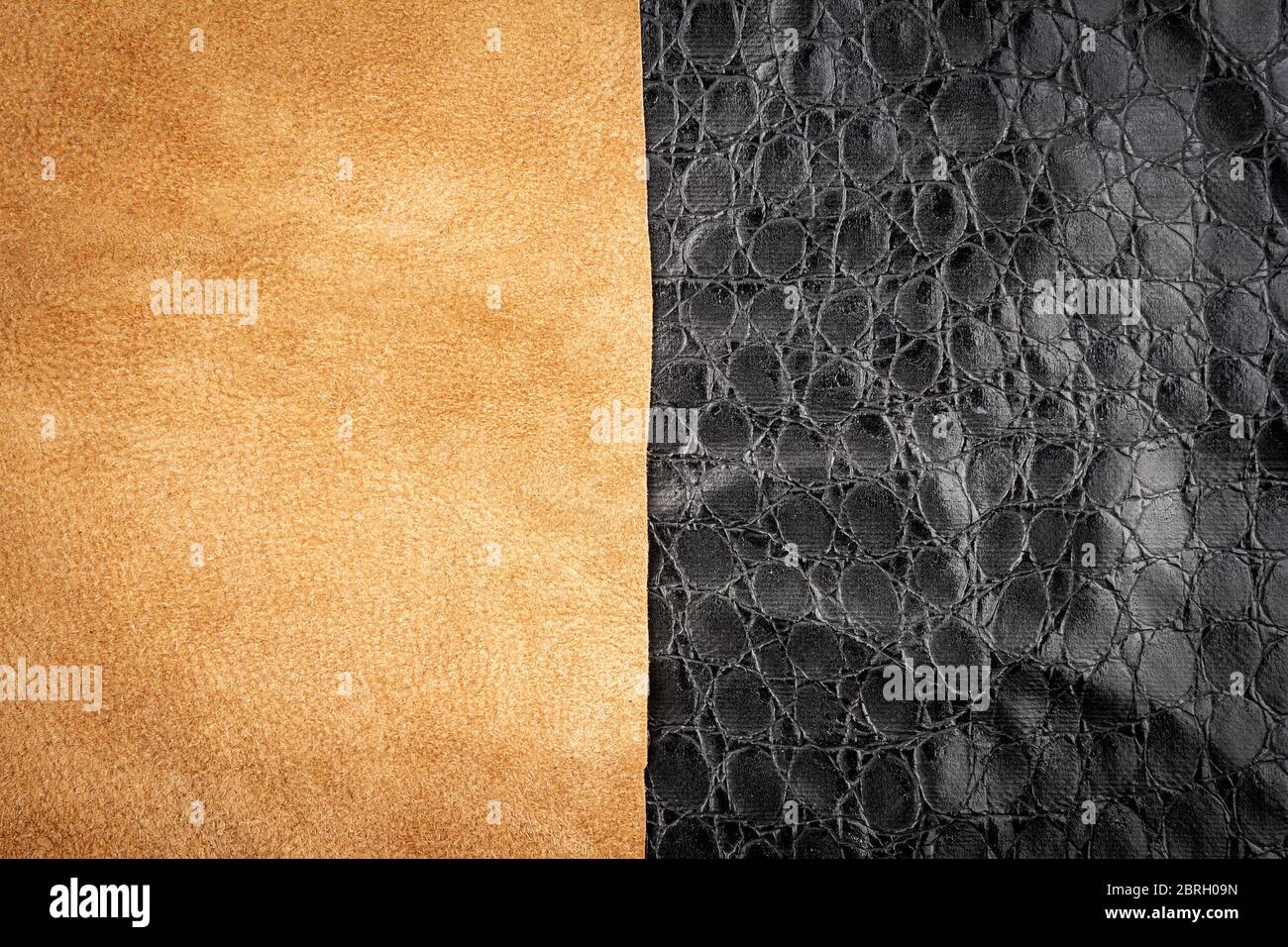 Brown leather and black artificial alligator skin textures background ...