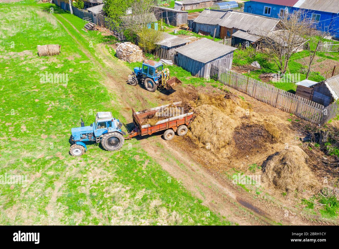 Fertilizer manure loading for planted vegetables in fields near ...