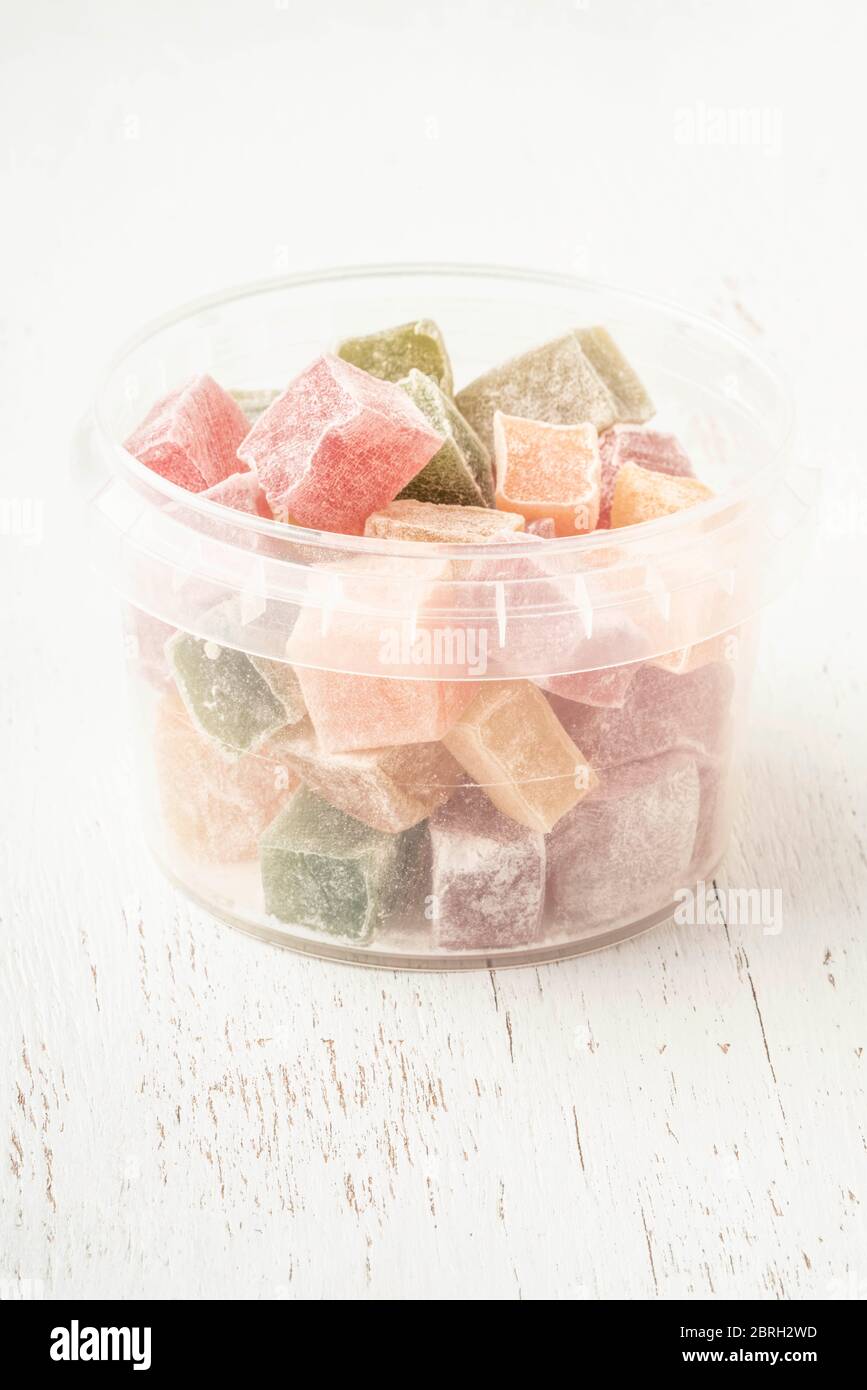 colorful assortment of Turkish delights in a plastic jar in order to ...
