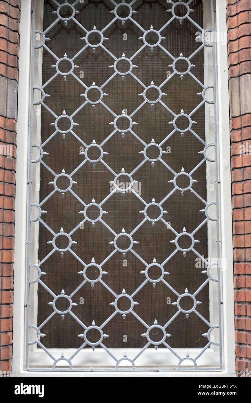 Protection Metal Bars With Spiked at Window Stock Photo - Alamy