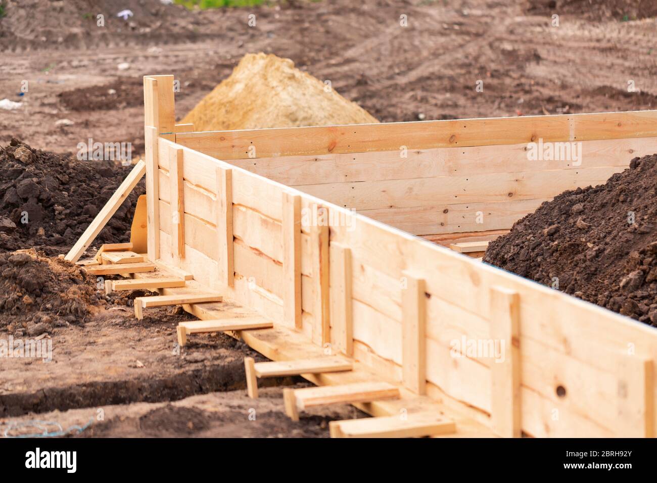 Wooden formwork for creating strip foundation for new house basis ...