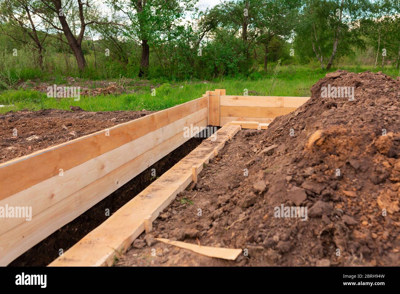 Wooden formwork for creating strip foundation for new house basis ...
