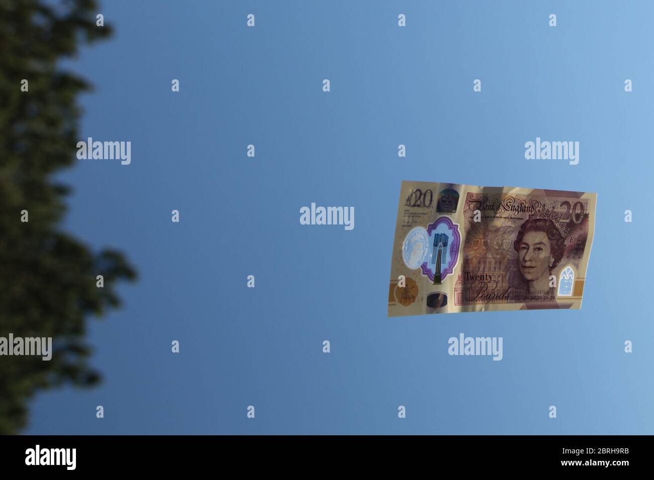 Money blowing away hi-res stock photography and images - Alamy