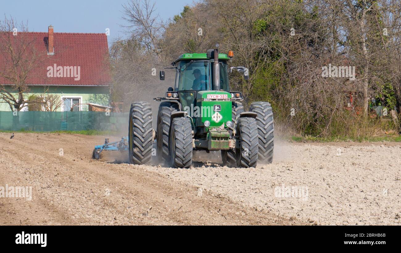 Nagybajcs Hungary 04 04 2020: A large, modern John Deere 4755 tractor ...