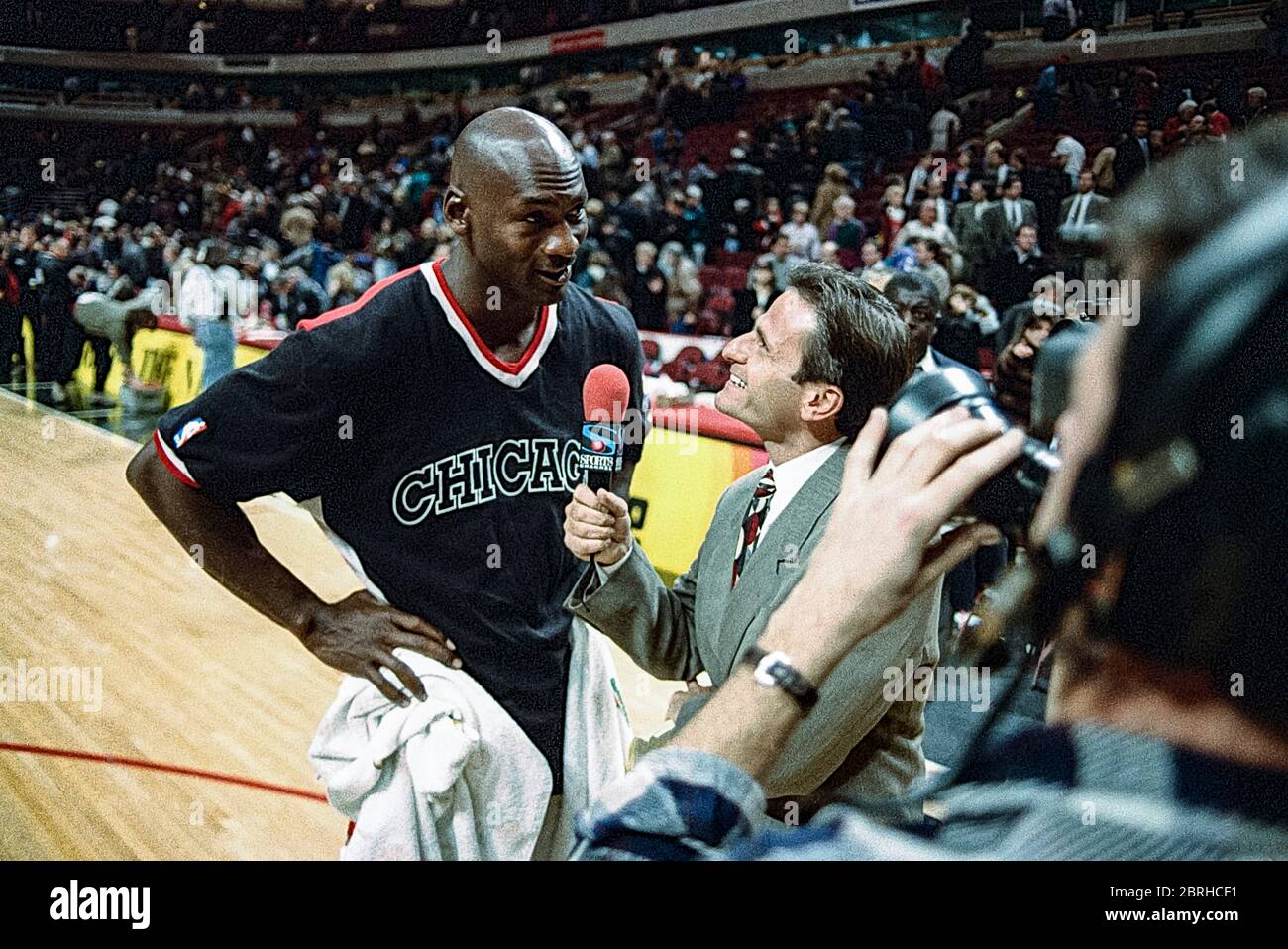 Michael Jordan competing for the NBA Chicago Bulls against the Miami ...