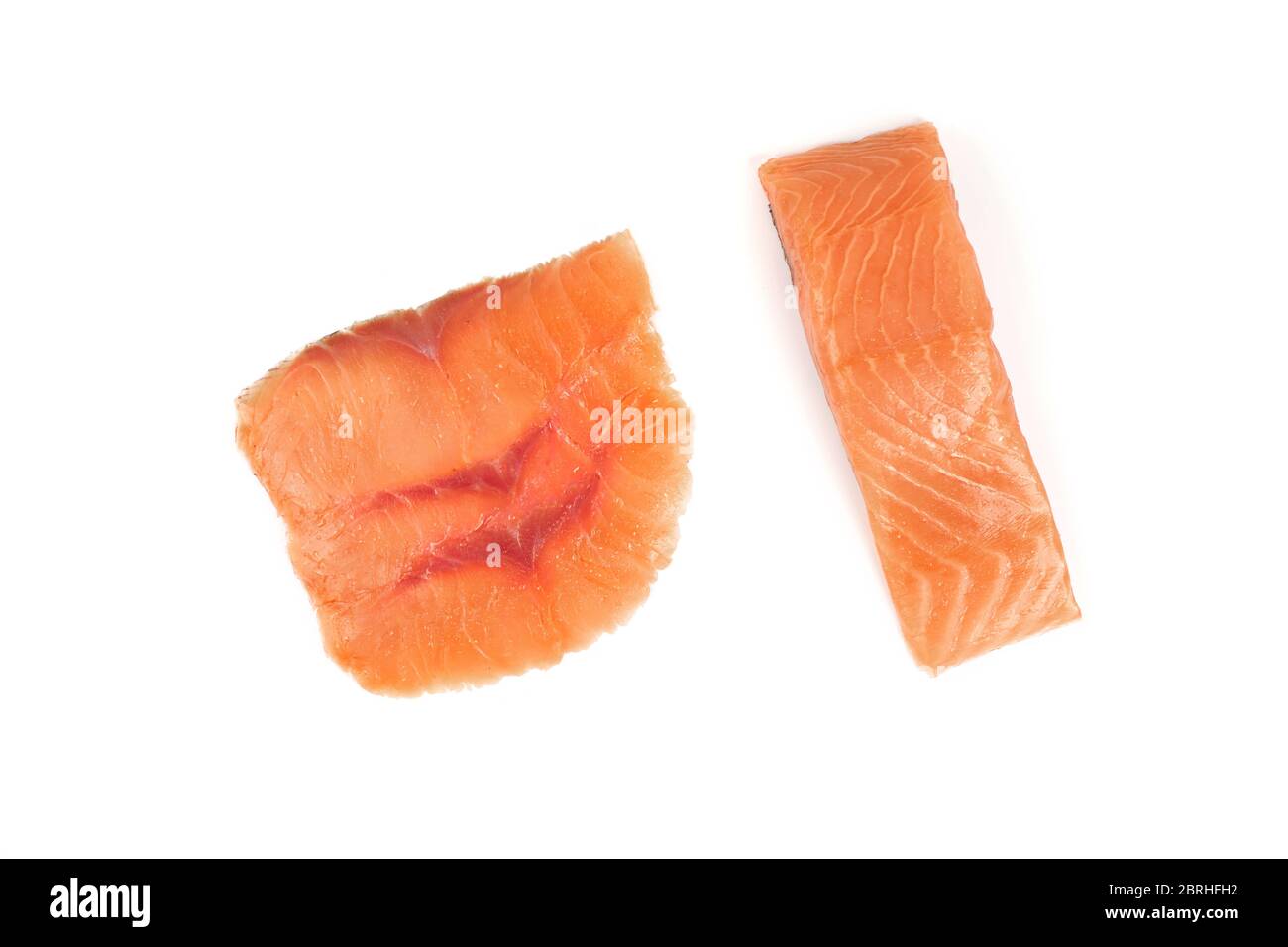 sliced red fish with lemon on white background Stock Photo - Alamy