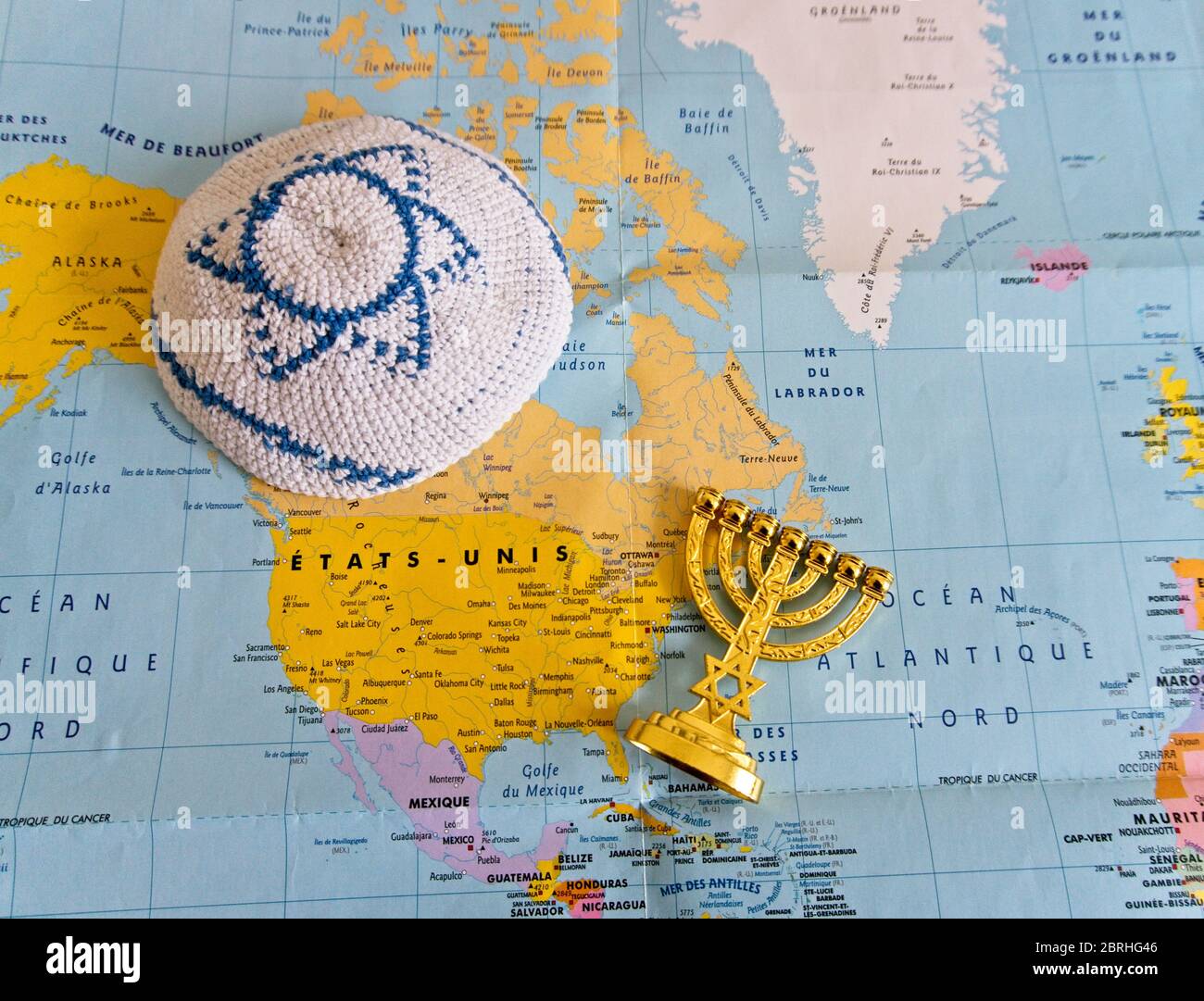 Photo of a north american map with a jewish yarmulke and a chandelier ...