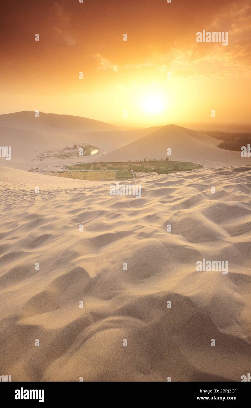 Crescent Moon Lake Oasis at Sunset, Dunhuang, Gansu Province, China ...