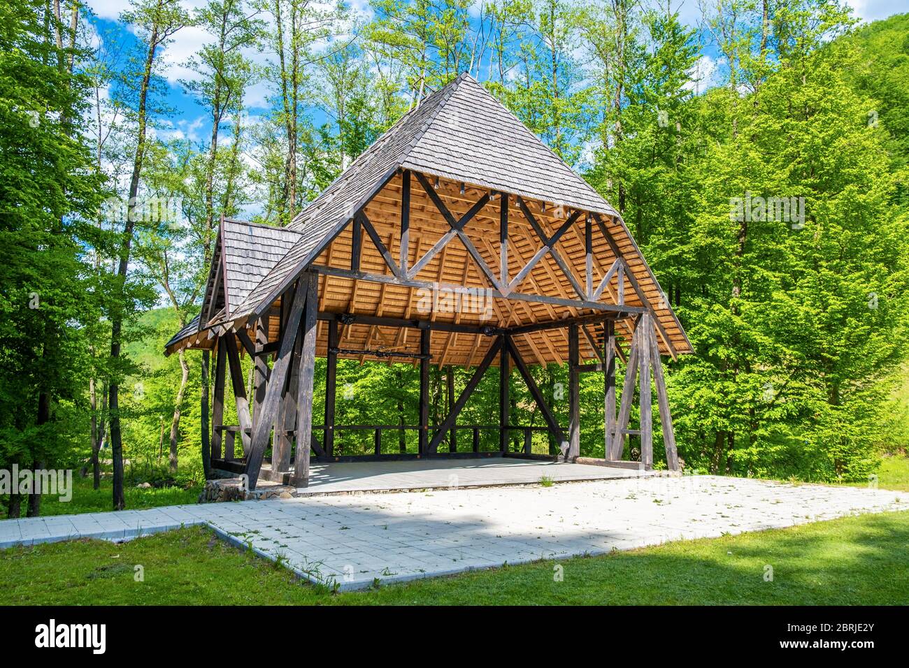 Wooden arbor on the background of the forest Stock Photo - Alamy