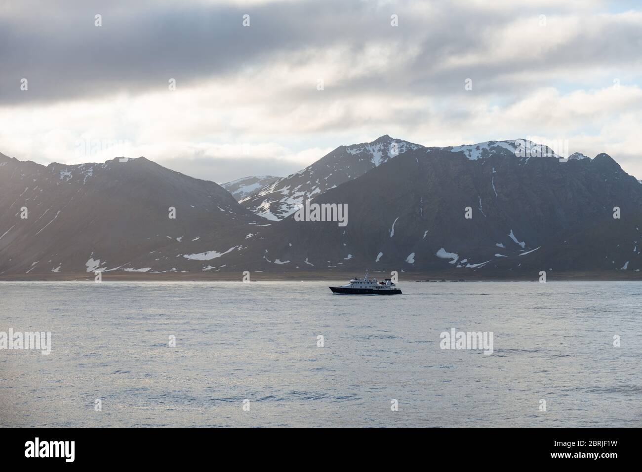 Arctic landscape with sea and mountains in Svalbard, Norway Stock Photo ...