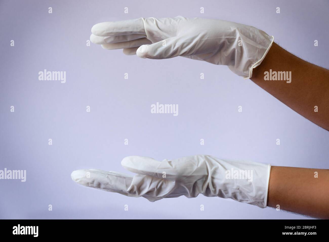 Female doctor wearing gloves hands hi-res stock photography and images ...