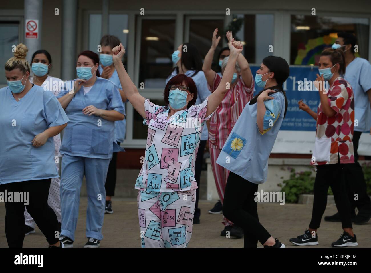 Staff outside Abbeydale Court Care Home in Hamilton clapping to salute ...
