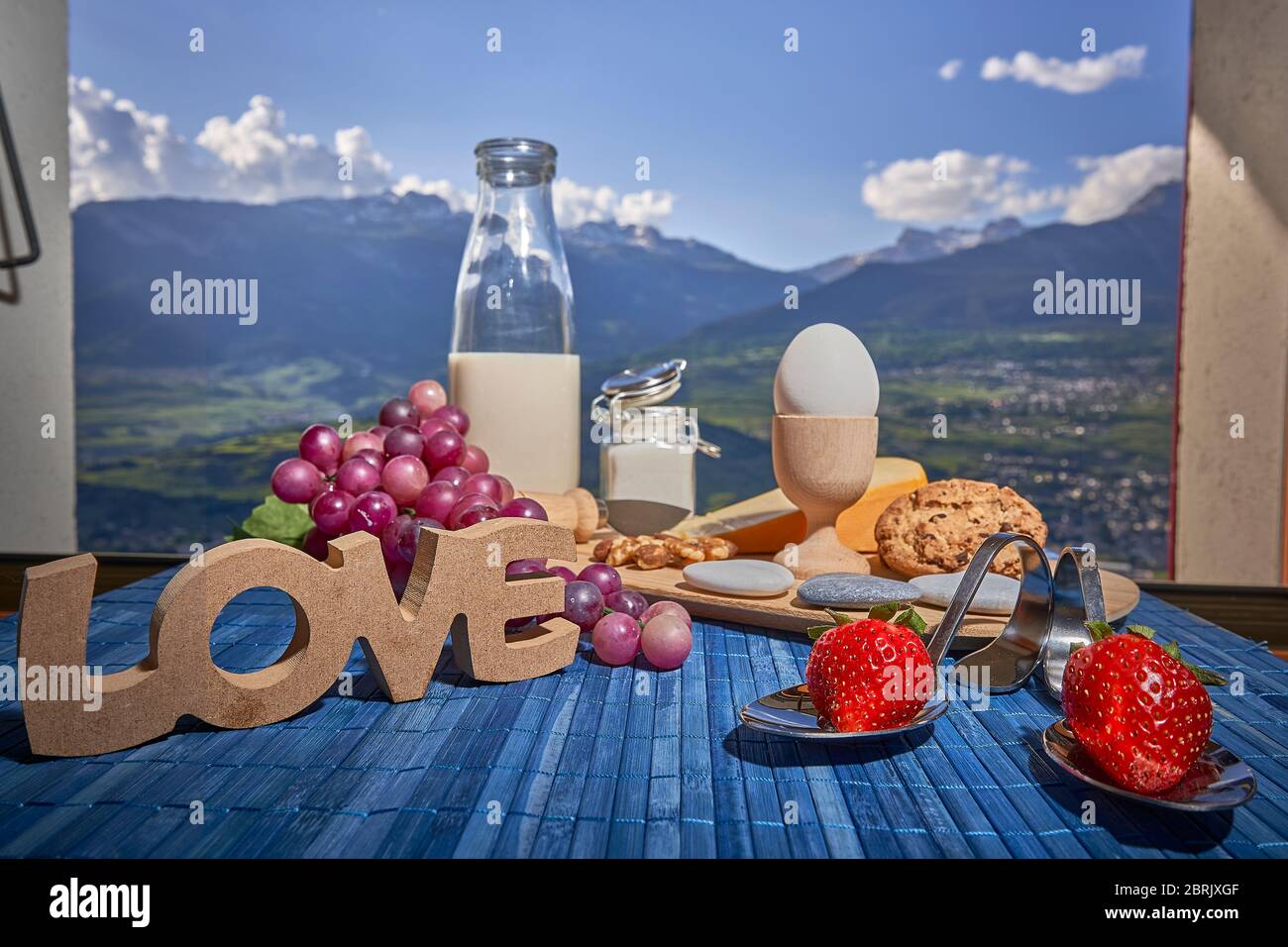 Energy Breakfast at sunny day in Switzerland Alps Stock Photo - Alamy