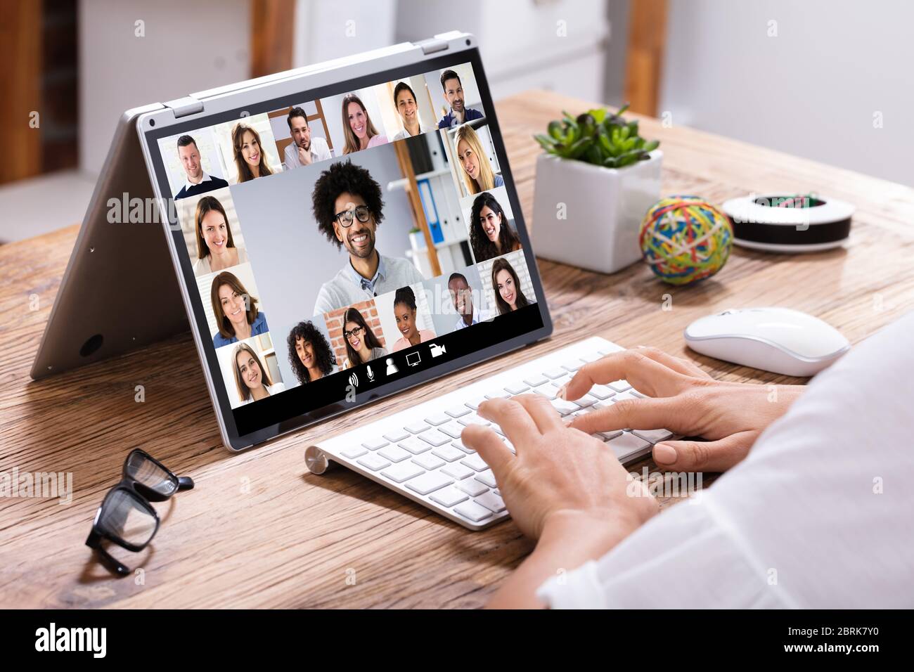 Woman Working From Home Having Online Group Videoconference On Laptop ...