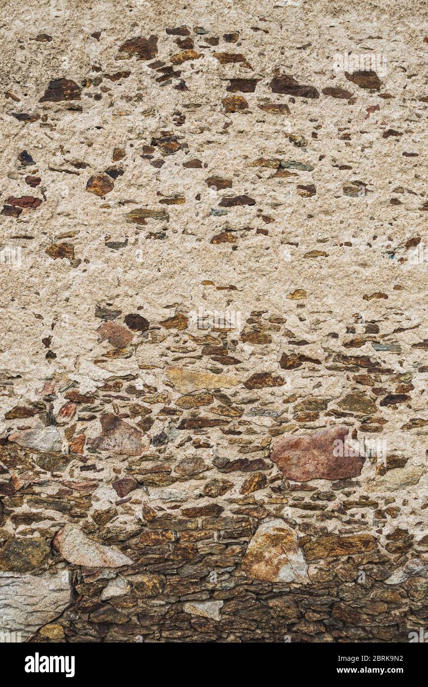 barn stone wall - texture of an old stone wall with plaster Stock Photo ...