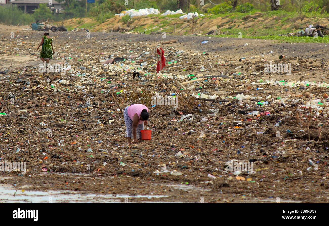 Sea Pollution: Garbage dumped in the Sri Lankan Sea near Colombo. women ...