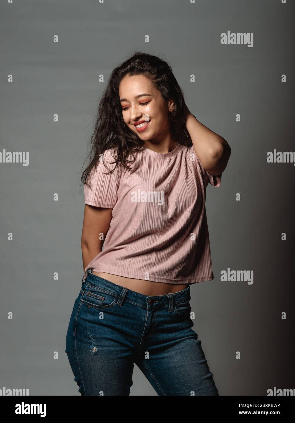 Studio fashion portrait of a modern girl wearing trendy clothes Stock ...