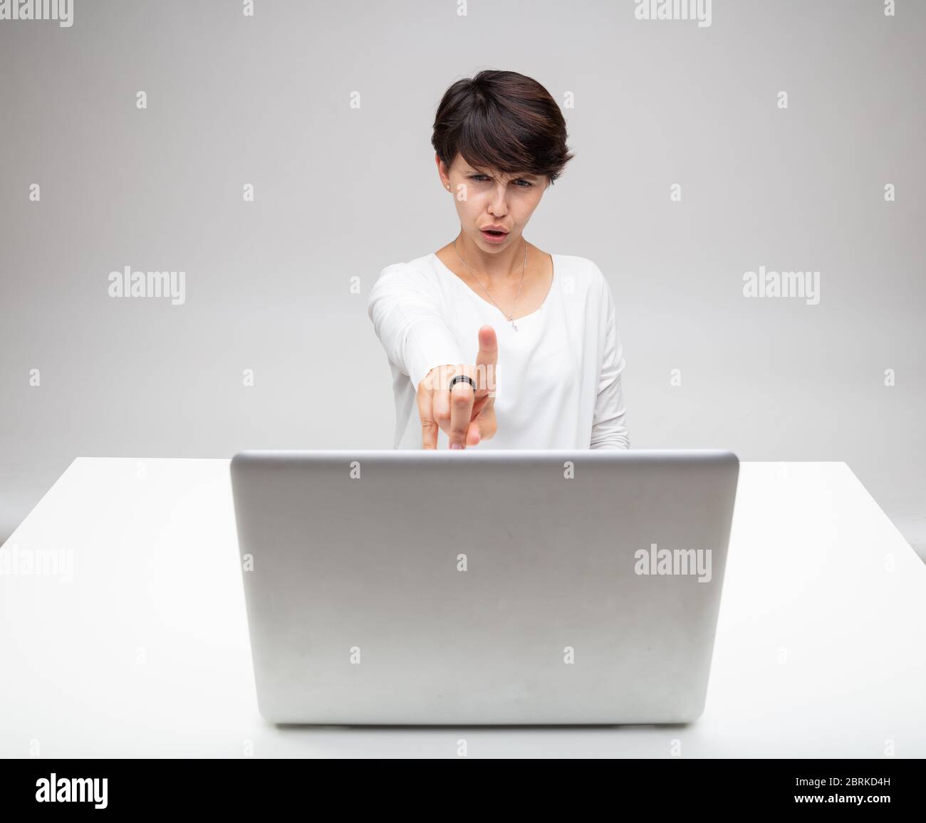 Stern face woman hi-res stock photography and images - Alamy