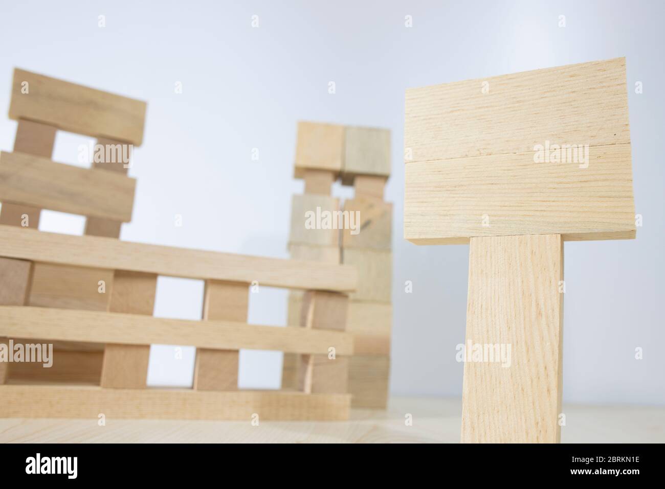 Building with wooden parts. Close-up on white background. Studio Stock ...