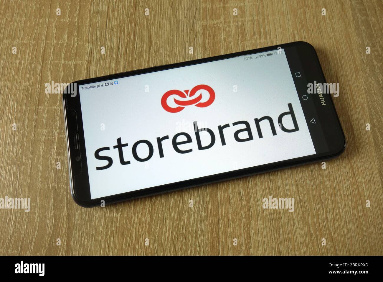 Storebrand financial services company logo displayed on smartphone ...