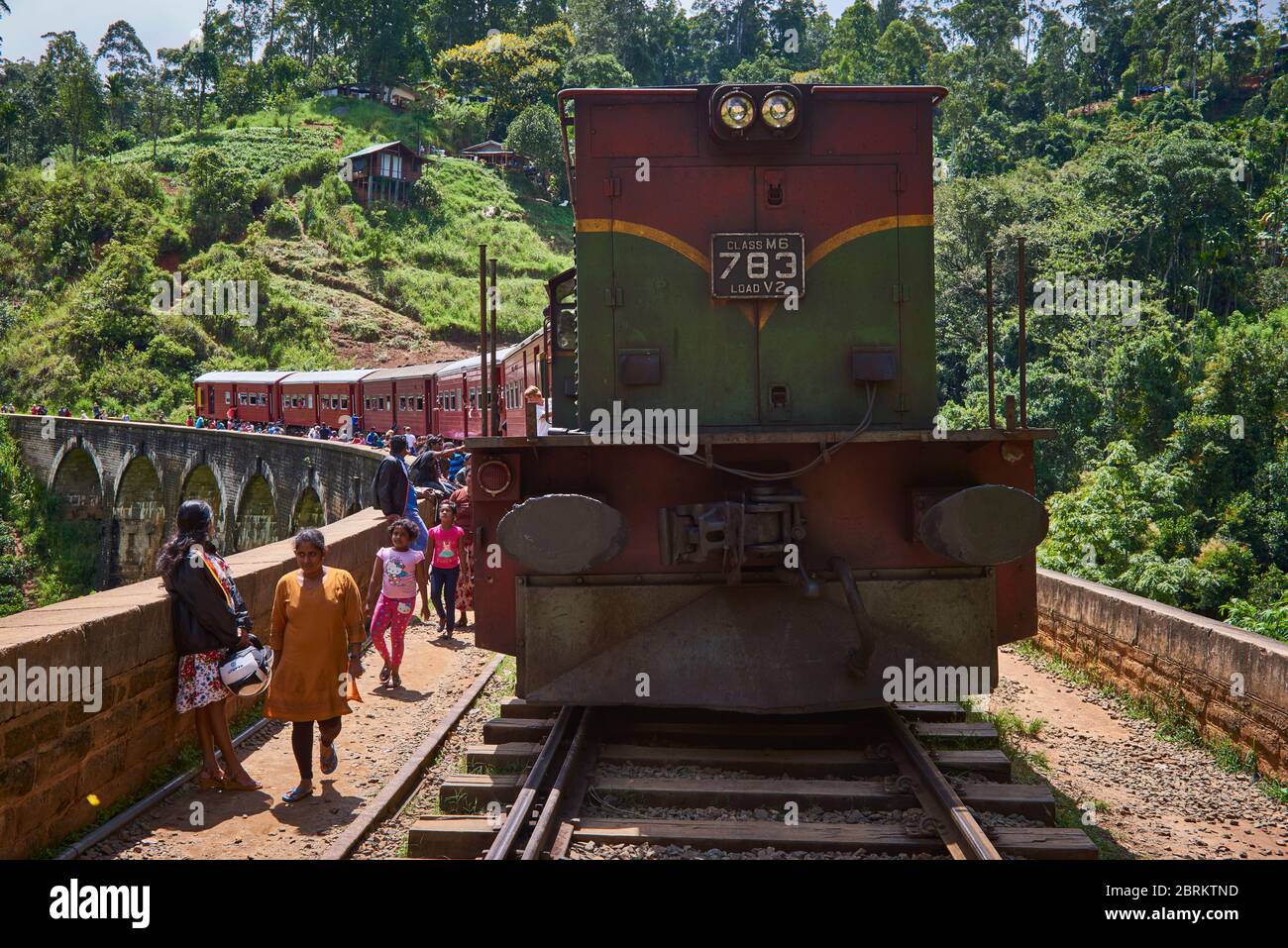 Old style train stationed on Nine Arch Bridge in Ella, Sri Lanka Stock ...