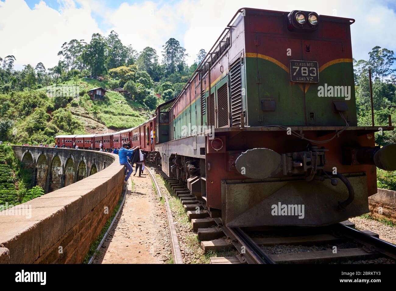 Old style train stationed on Nine Arch Bridge in Ella, Sri Lanka Stock ...