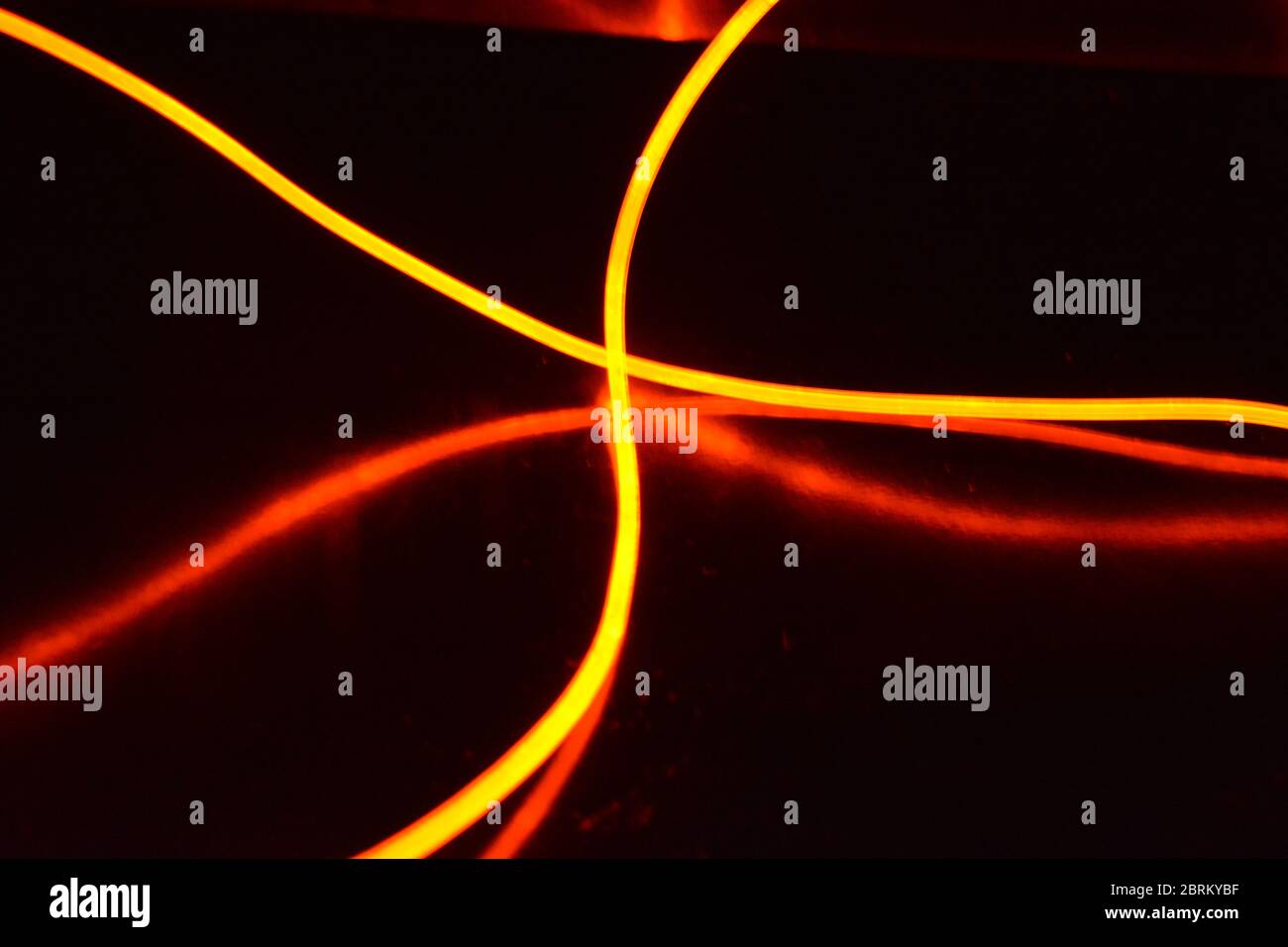 A light guide, a wire with orange light, a light guide wire with ...