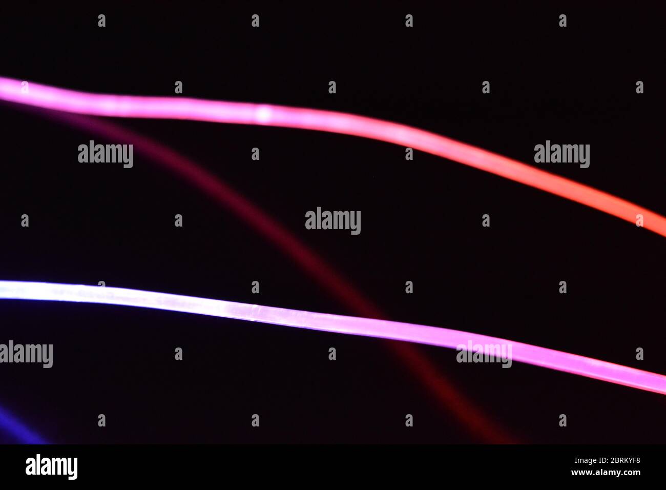 A wire with orange and blue light, a light guide wire with different ...