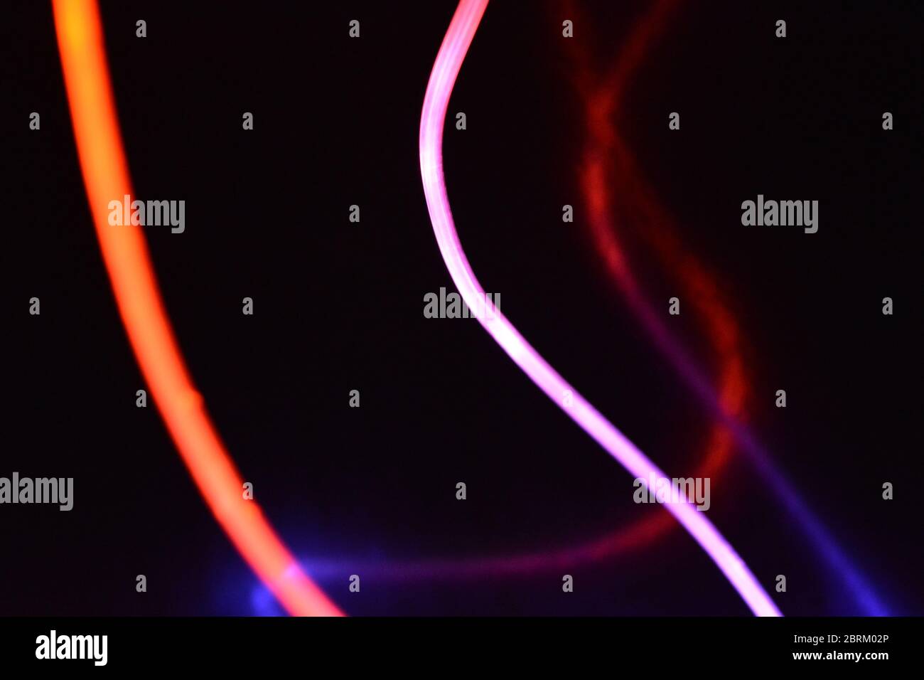A wire with orange and blue light, a light guide wire with different ...