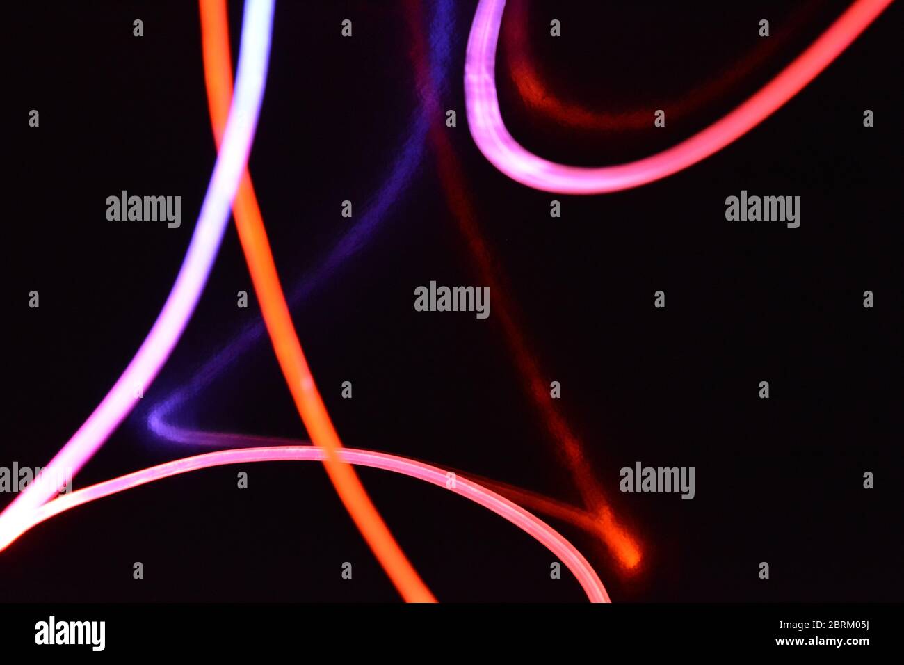 A wire with orange and blue light, a light guide wire with different ...