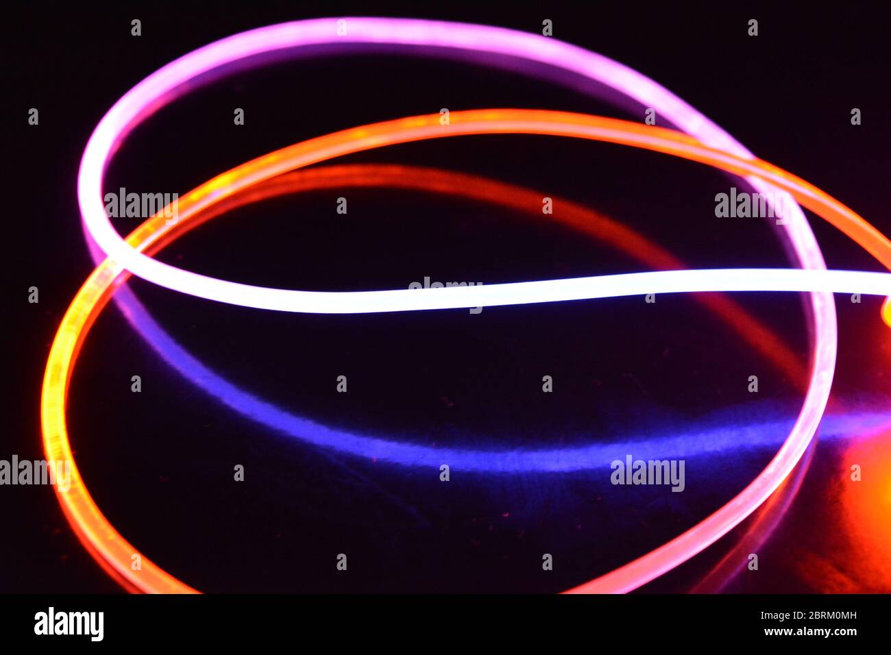 A wire with orange and blue light, a light guide wire with different ...