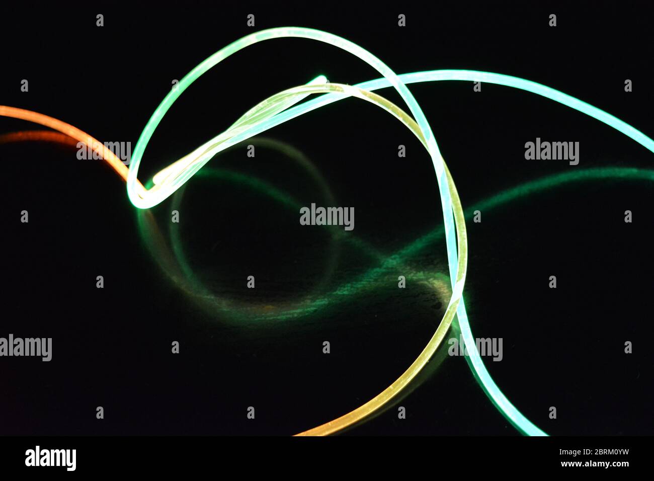 A wire with orange and green light, a light guide wire with different ...