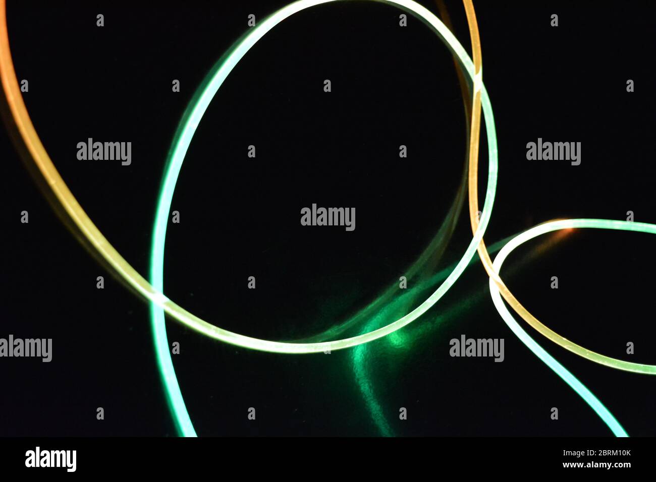 A wire with orange and green light, a light guide wire with different ...