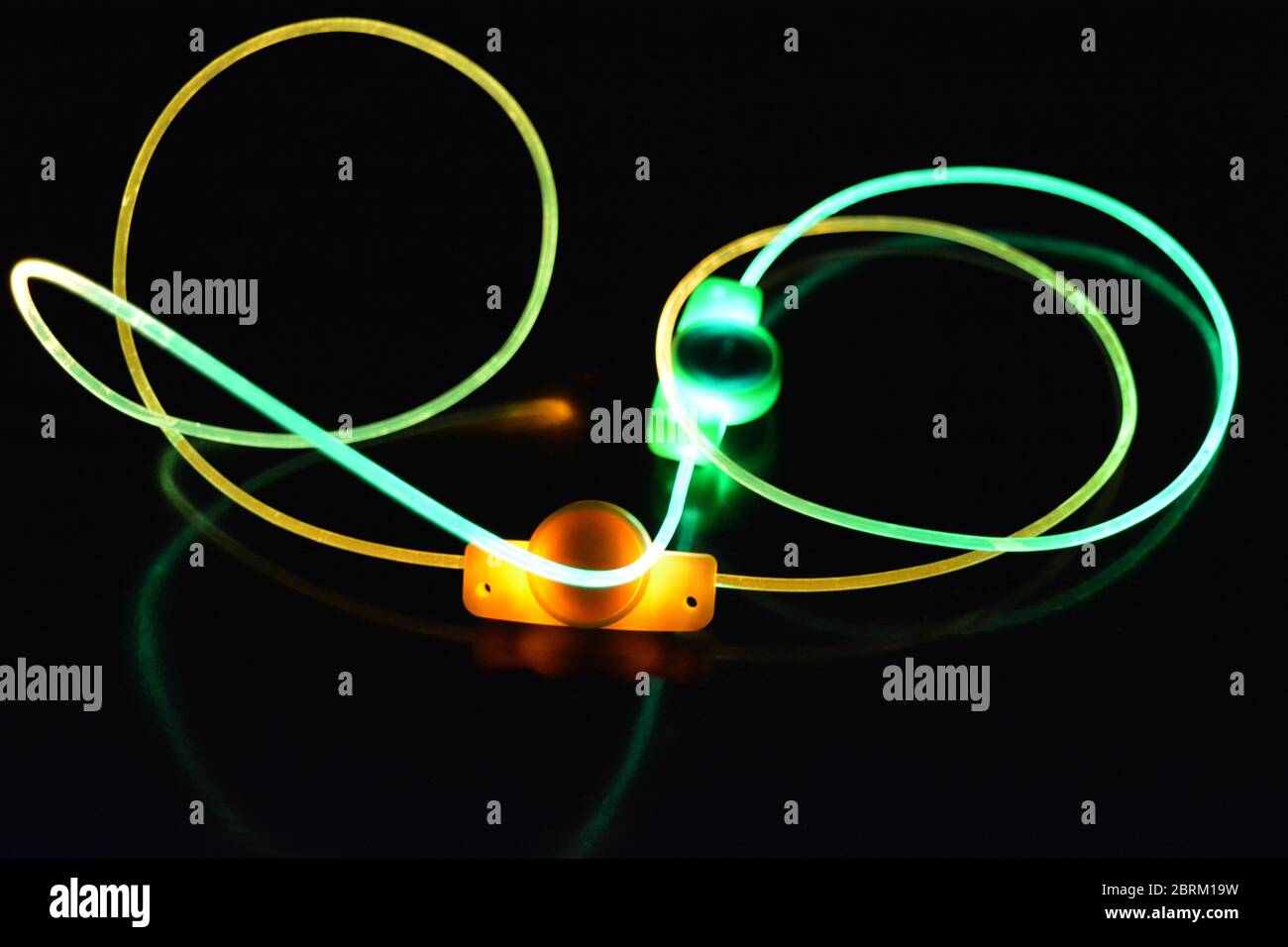 A wire with orange and green light, a light guide wire with different ...