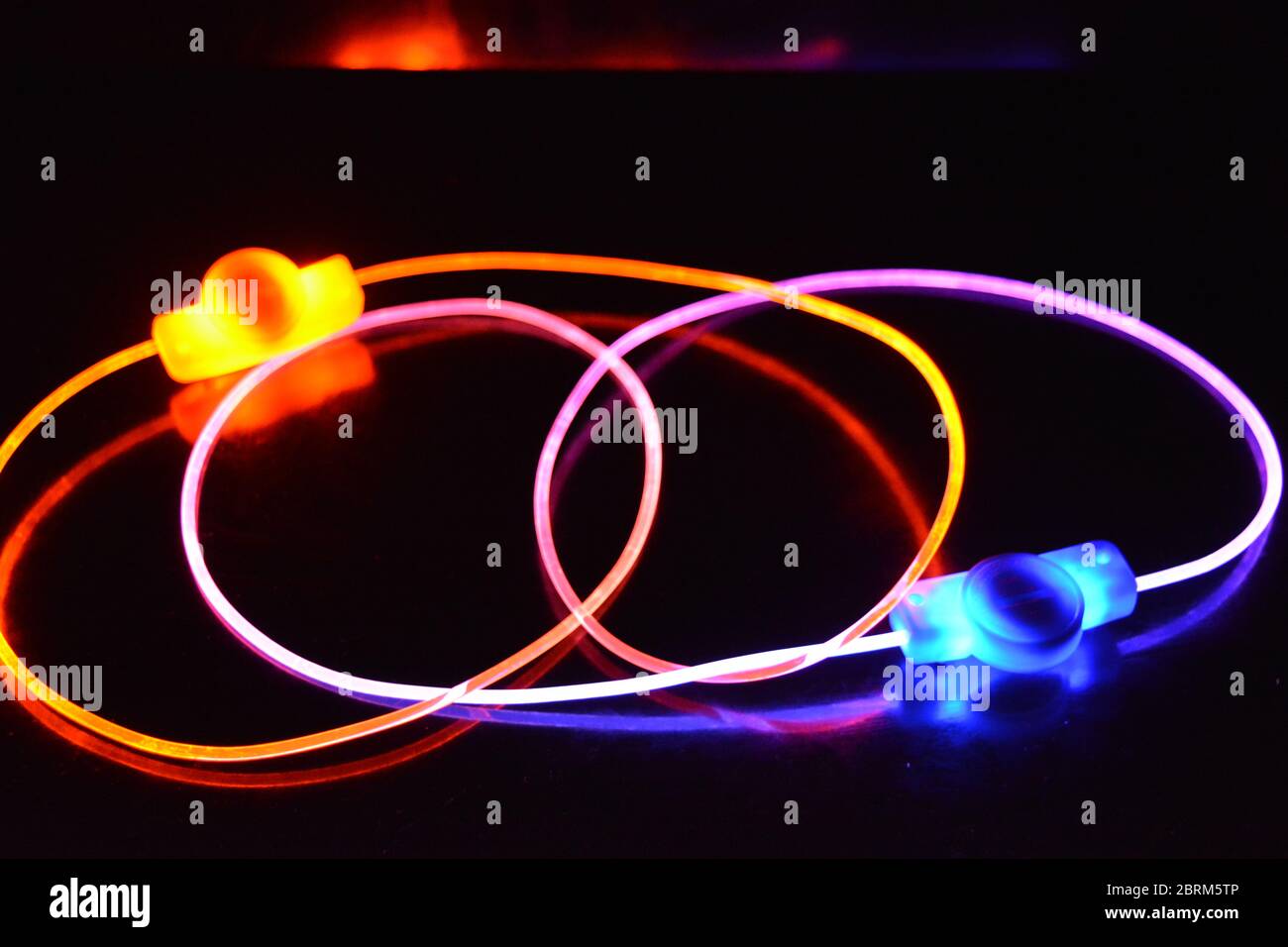 Orange and blue light wire, a light guide wire with different light ...