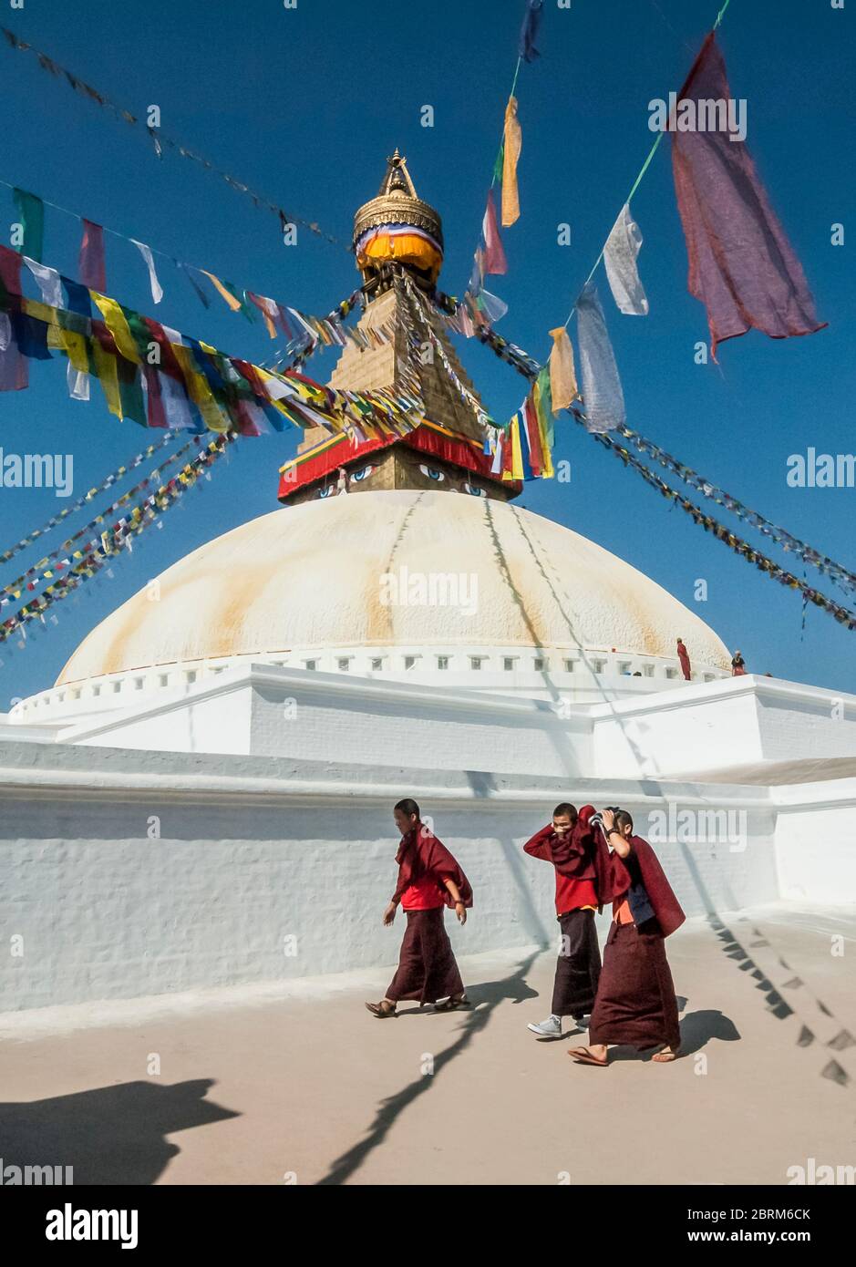 Kathmandu, Bodhnath. Colourful street scenes with the faithful ...