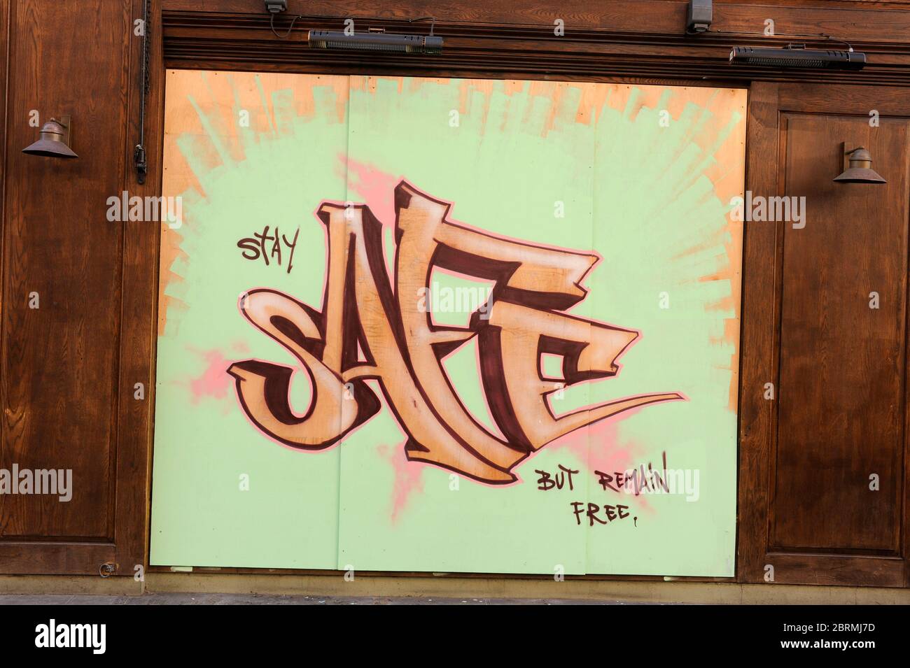 London, UK, 20 May 2020 Graffiti on boarded up Cafe Boheme in Soho ...