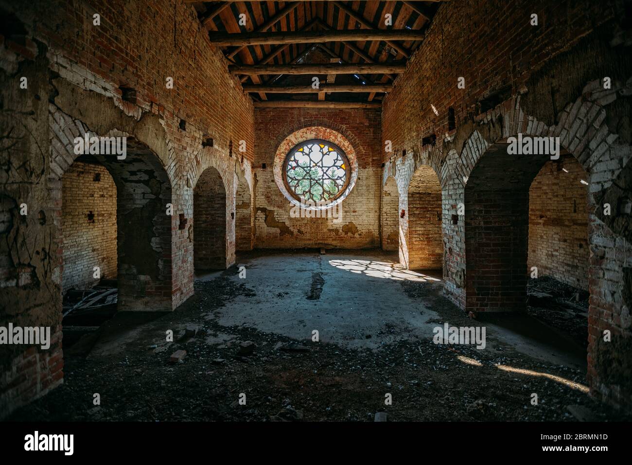 Round stained glass window in old abandoned castle Stock Photo - Alamy