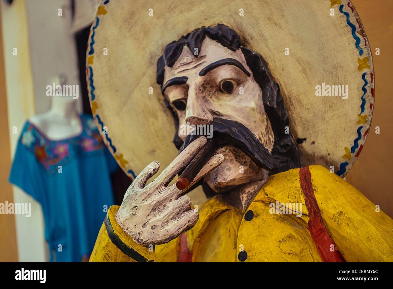 Statue of a Mexican man with sombrero smoking a cigar Stock Photo - Alamy