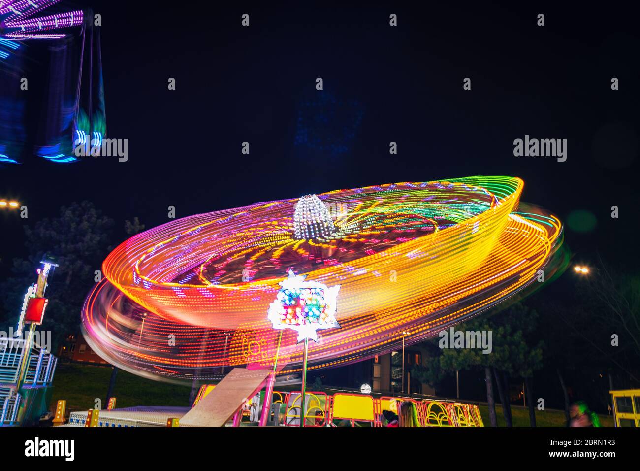 Long exposure carnival ride hi-res stock photography and images - Alamy