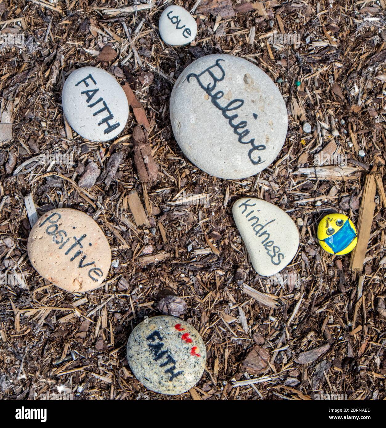 Messages of gratitude on small rocks all around the hospital Stock ...