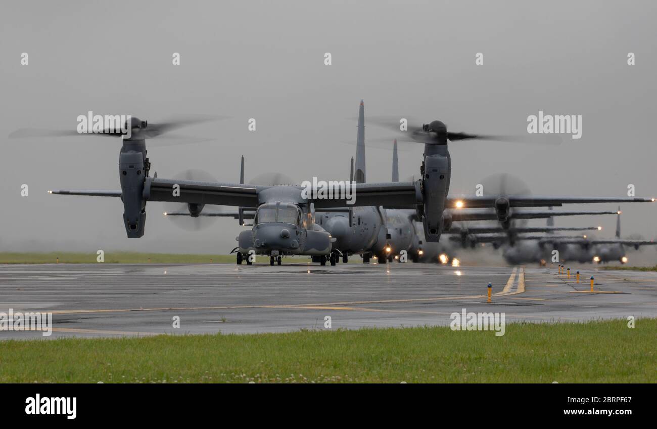 A CV-22 Osprey assigned to the 21st Special Operations Squadron taxi on ...